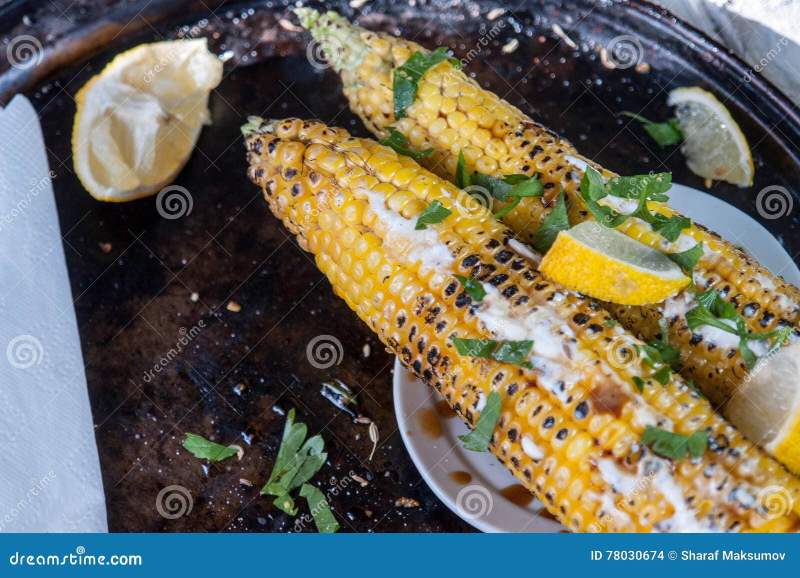 Grilled Corn on with Lemon, Herbs and Spices Stock Photo - Image of ...