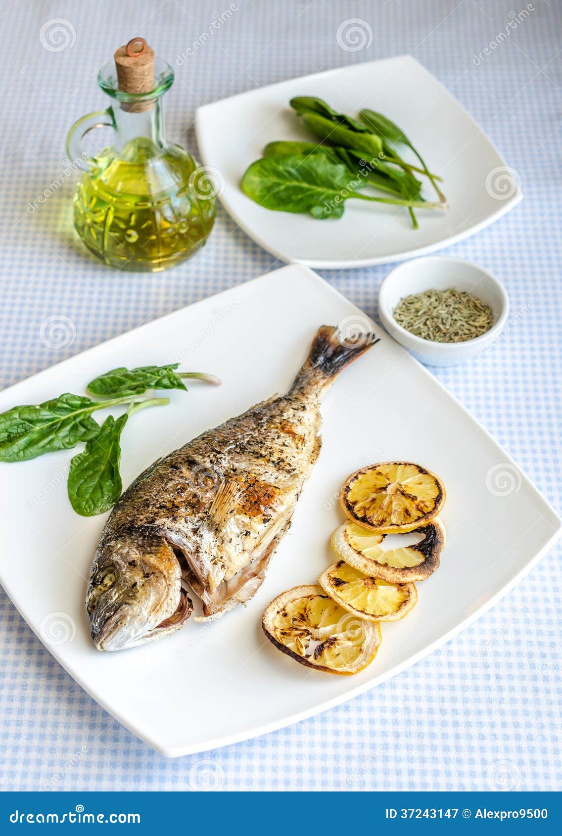 Grilled Dorada Fish with Lemon and Spinach Stock Image - Image of ...