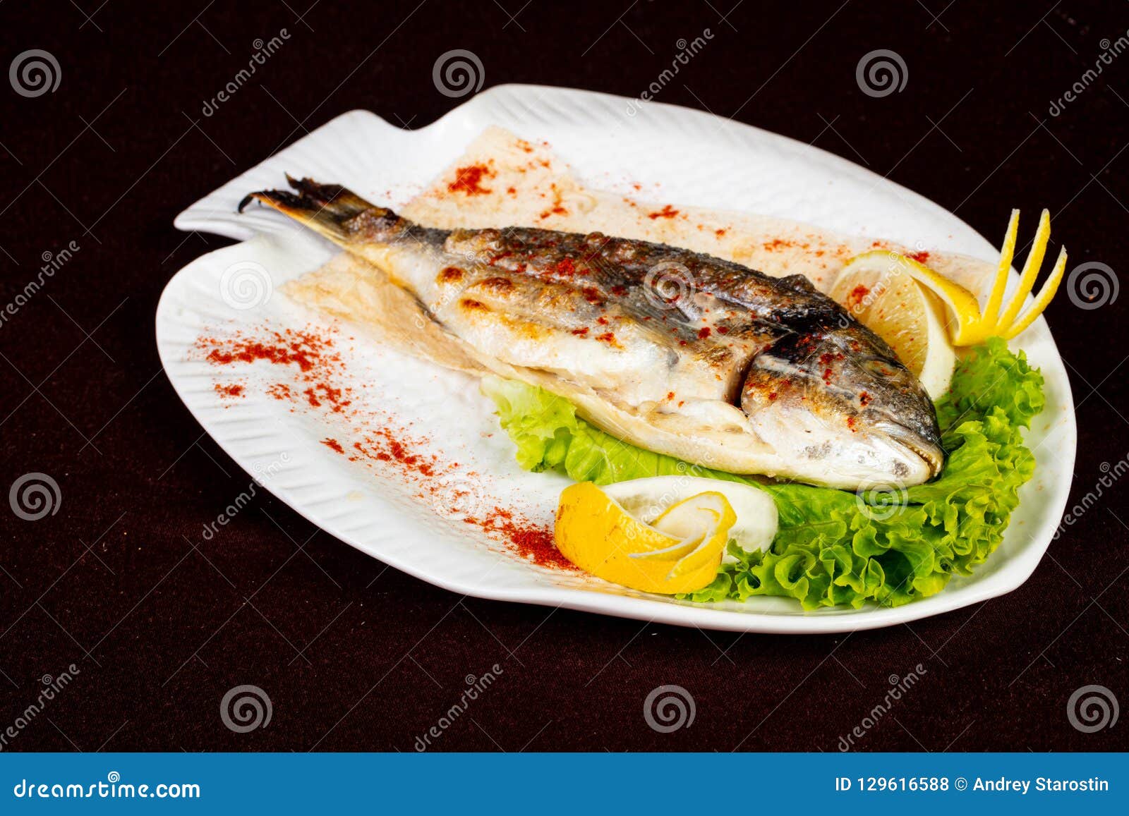 Grilled dorada fish stock photo. Image of cooking, dinner - 129616588
