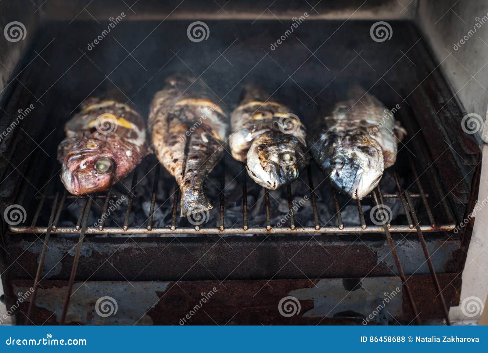Grilled Fish Barbecue with Spices and Lemon on the Grill Close Stock ...
