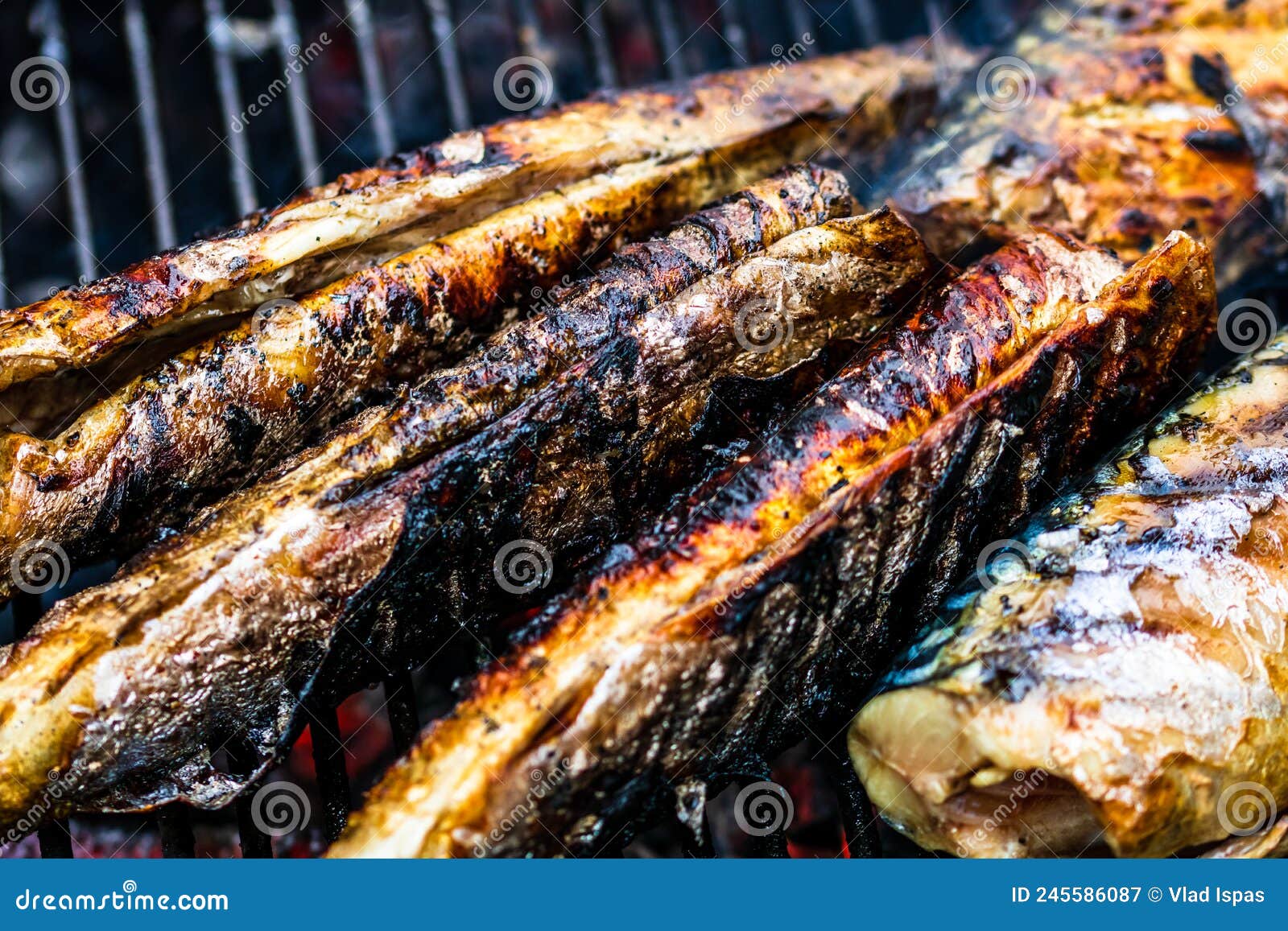Grilled Fish on Charcoal Grill. Fresh Fish Barbecue Stock Image - Image ...