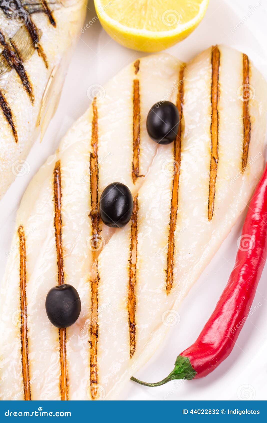 Grilled Fish Fillets with Burned Grid Stock Photo - Image of lemon ...