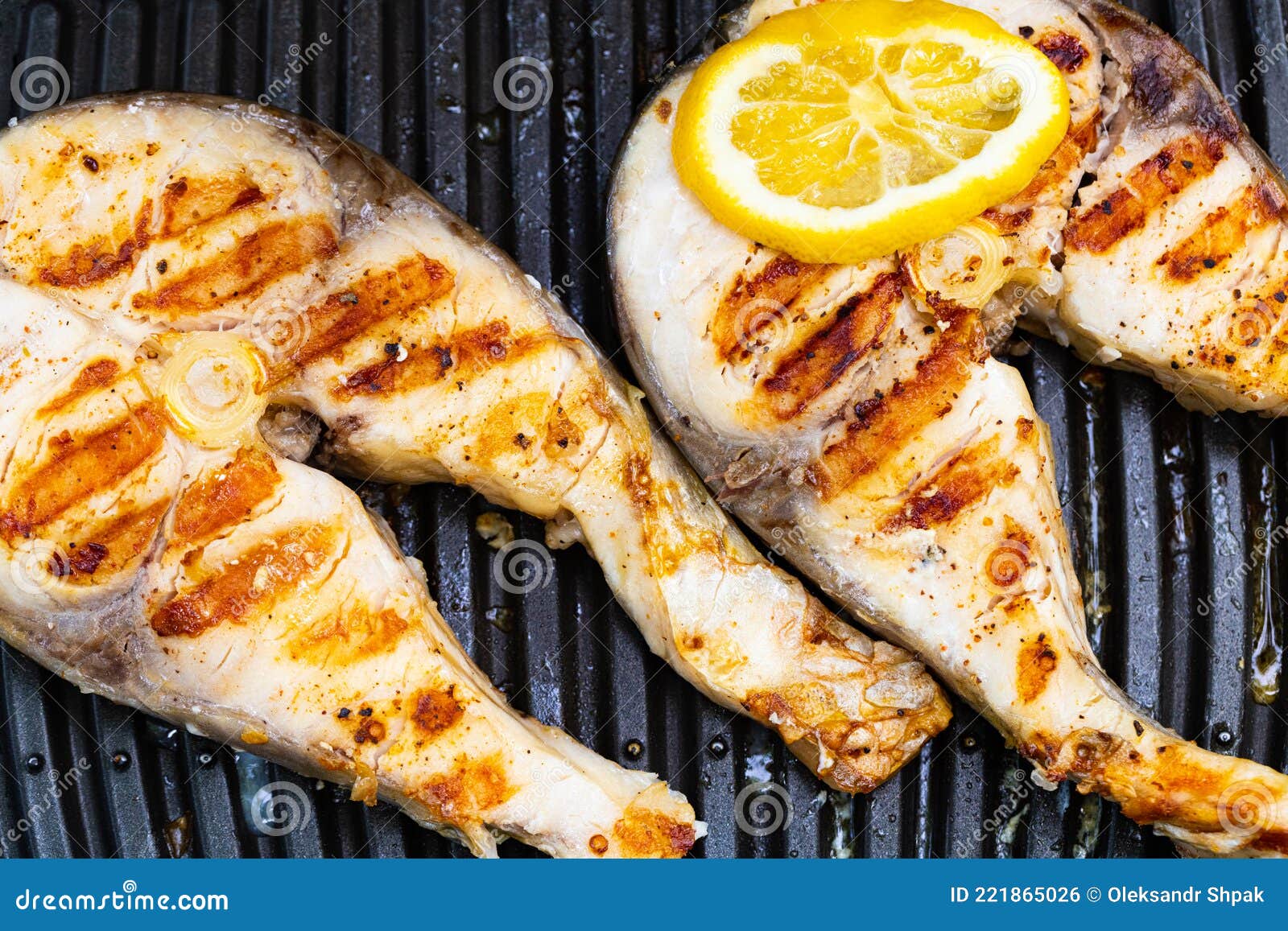 Grilled Fish in Grill Pan with Lemon Stock Photo - Image of barbq, meal ...