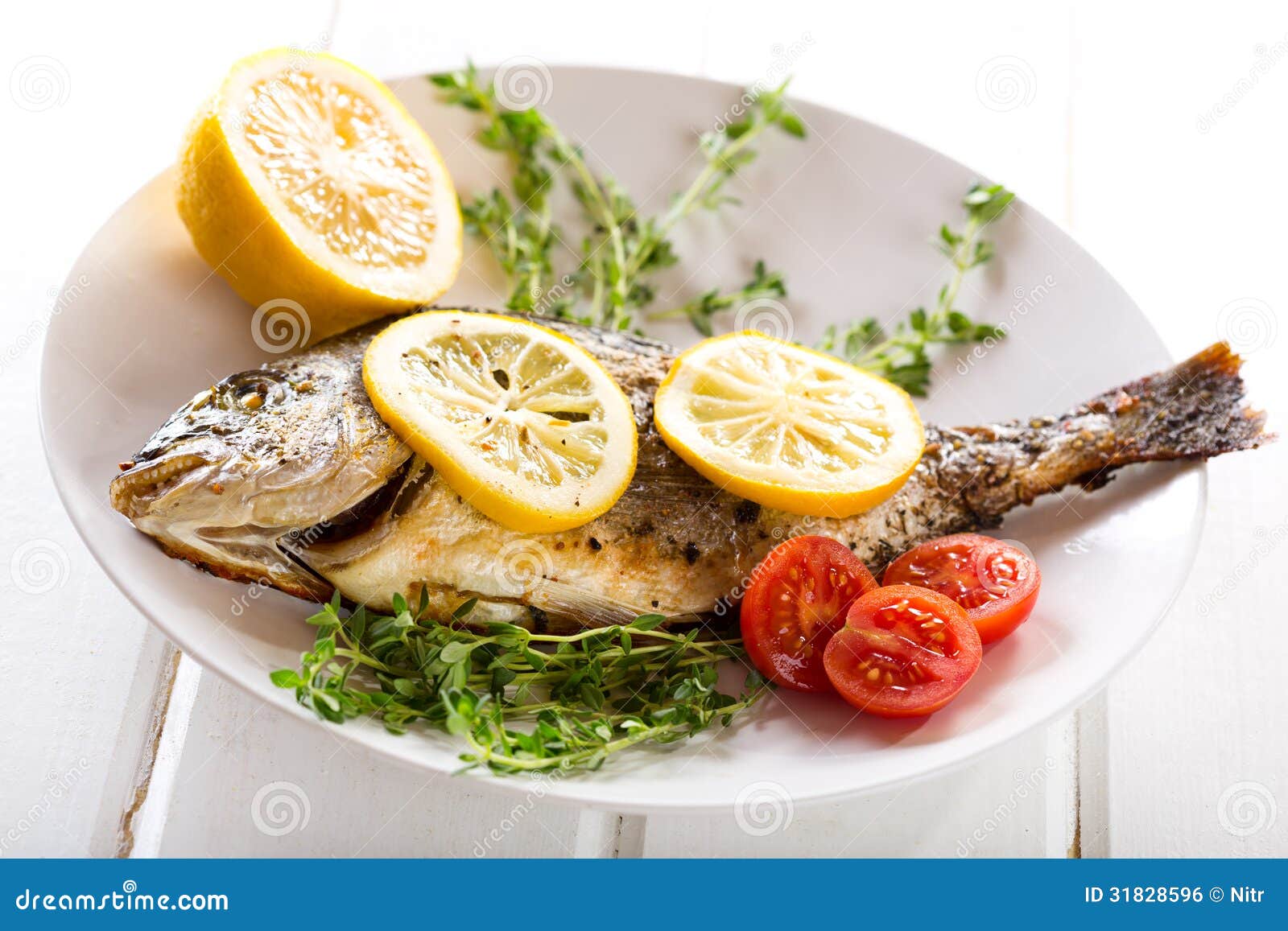 Grilled fish with lemon stock photo. Image of healthy - 31828596