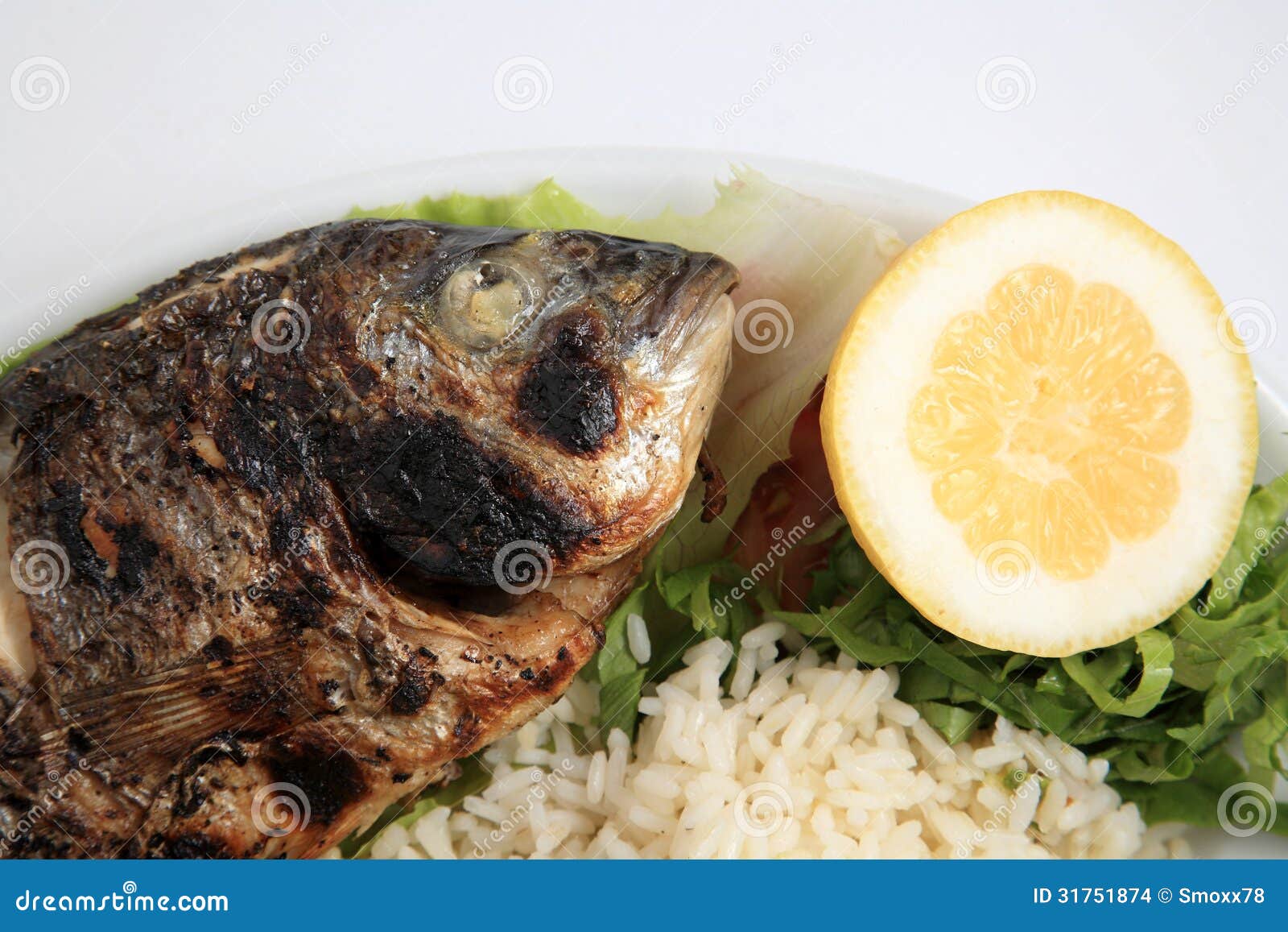 Grilled fish on a plate stock photo. Image of healthy - 31751874