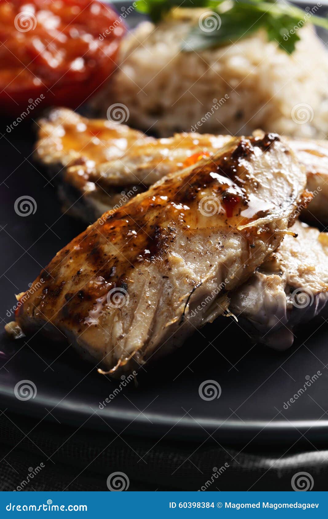 Grilled Fish with Rice Closeup Stock Photo - Image of closeup, napkin ...
