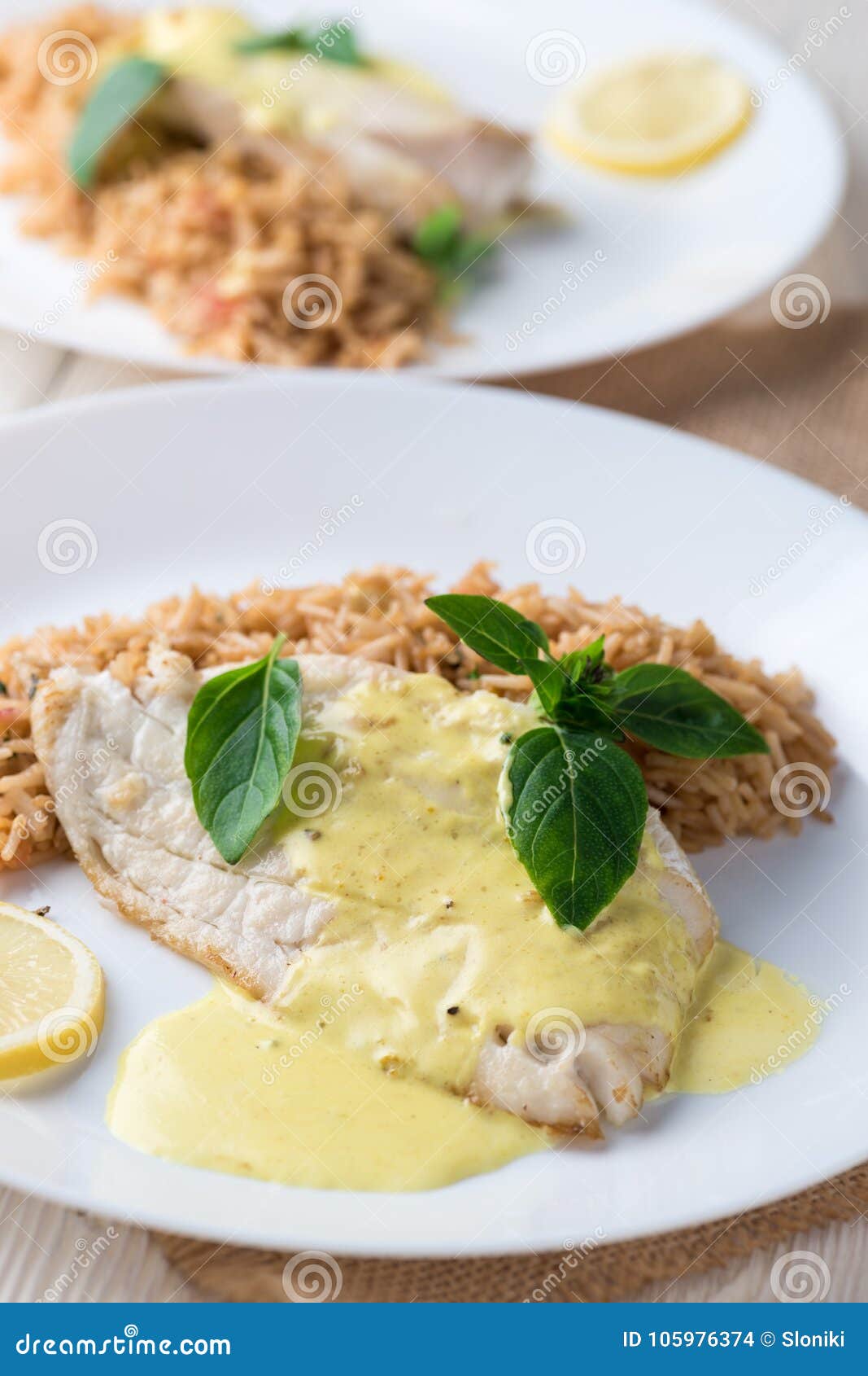 Grilled Fish with Rice and Lemon Sauce Stock Photo - Image of cuisine ...