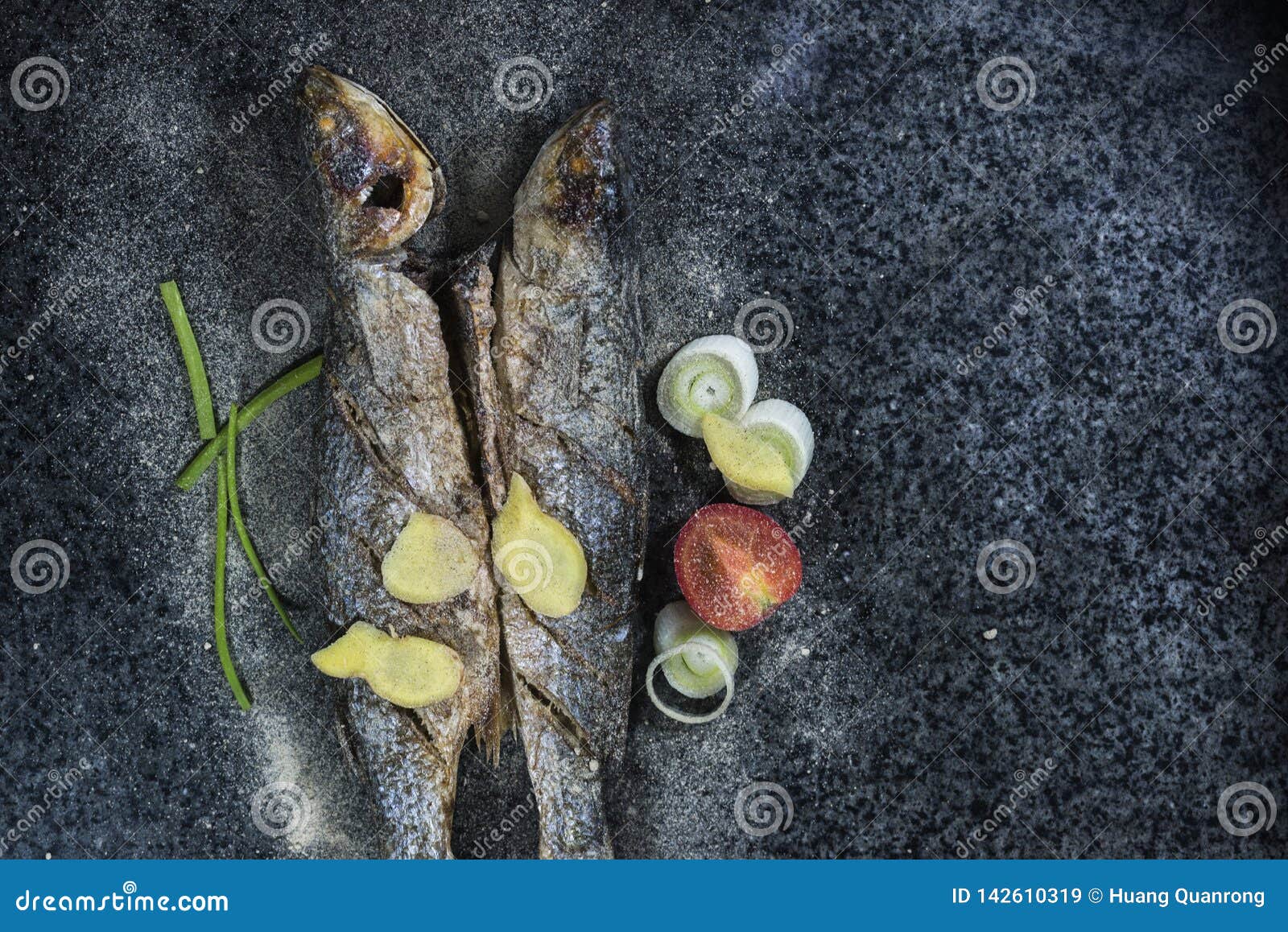 Grilled Fish with Spices, Vegetables and Herbs on Slate Background ...