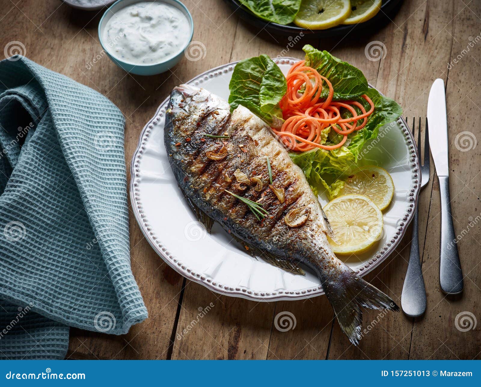 Grilled Fish on Wooden Kitchen Table Stock Image - Image of dorado ...