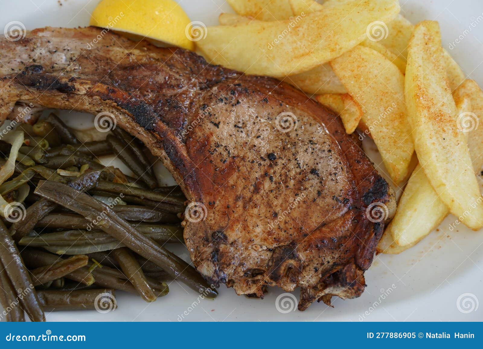 Grilled Giant Pork Chop with Chips and Salad Stock Image - Image of ...