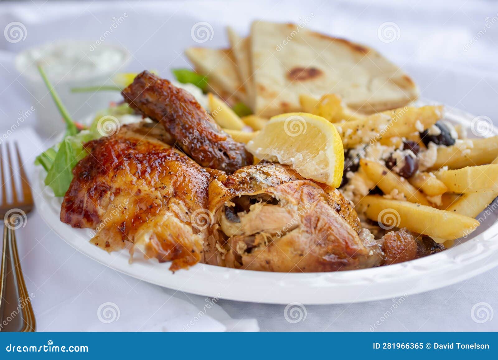 Grilled half chicken plate stock image. Image of mediterranean - 281966365