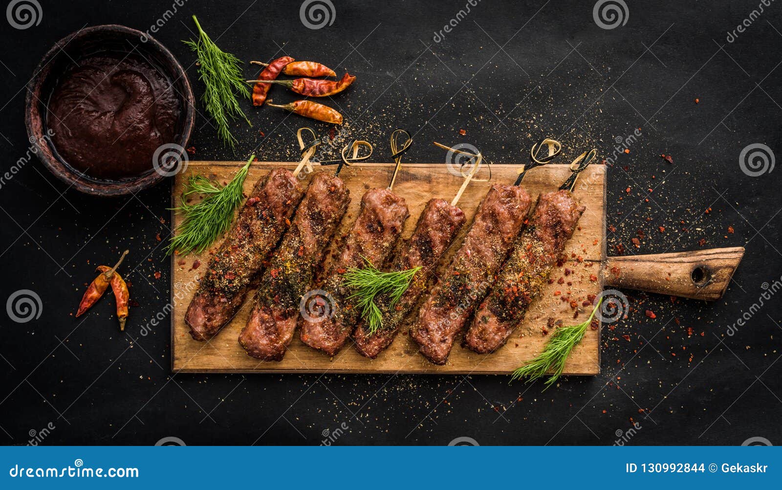 Grilled kebab with spices stock photo. Image of sauce - 130992844