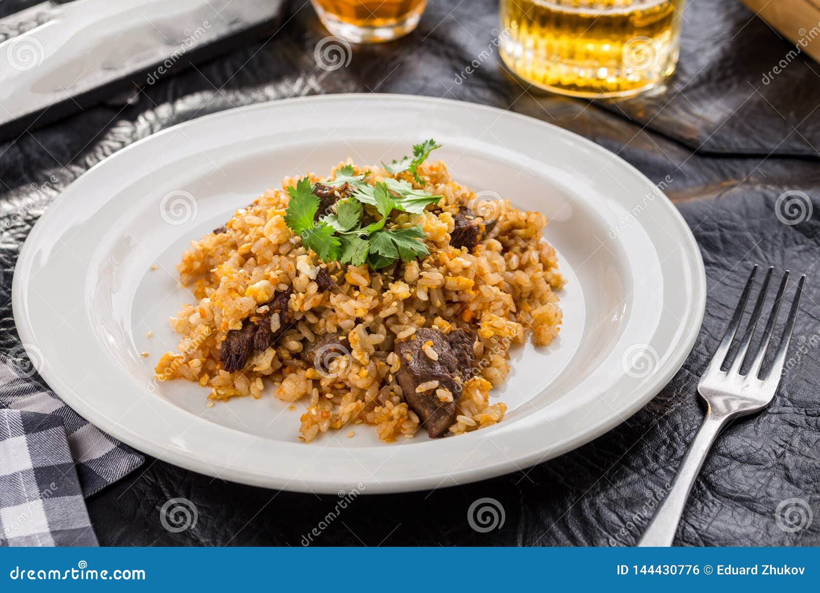 Grilled Lamb with Saffron Rice on Black Table Stock Photo - Image of ...