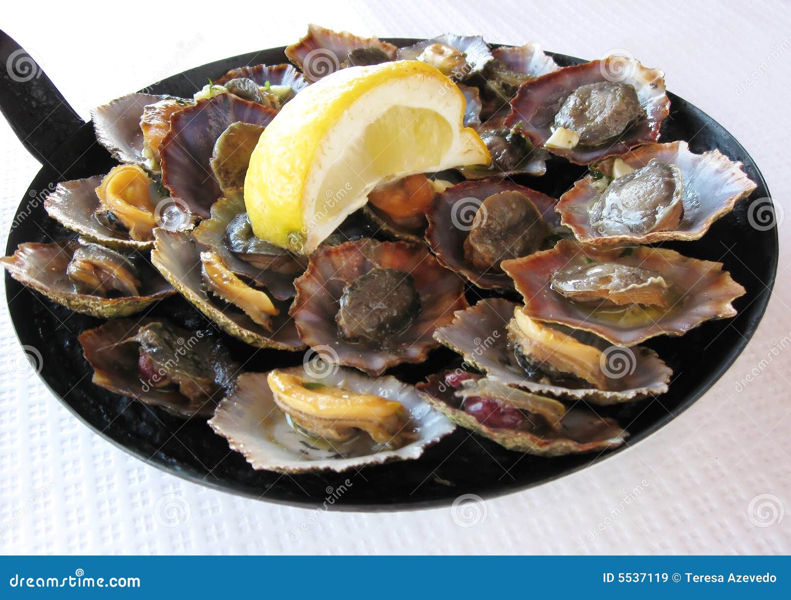 Grilled limpets stock image. Image of lemon, cuisine, traditional - 5537119