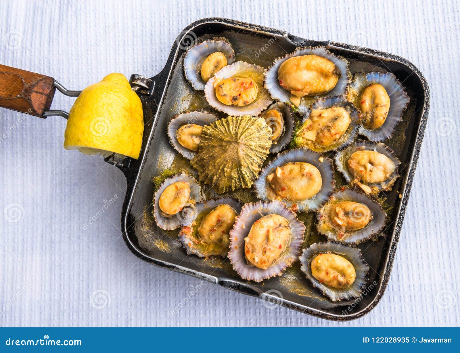 Grilled Limpets in the Pan Served with Lemon Stock Image - Image of ...