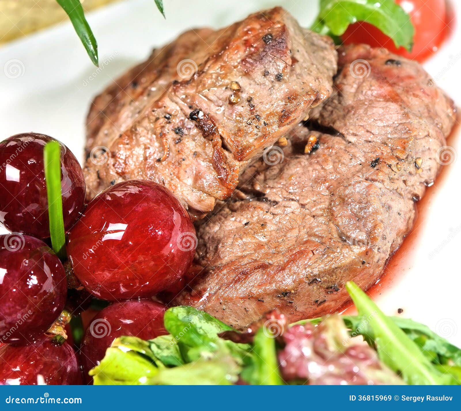 Grilled meat with grapes stock image. Image of insulated - 36815969