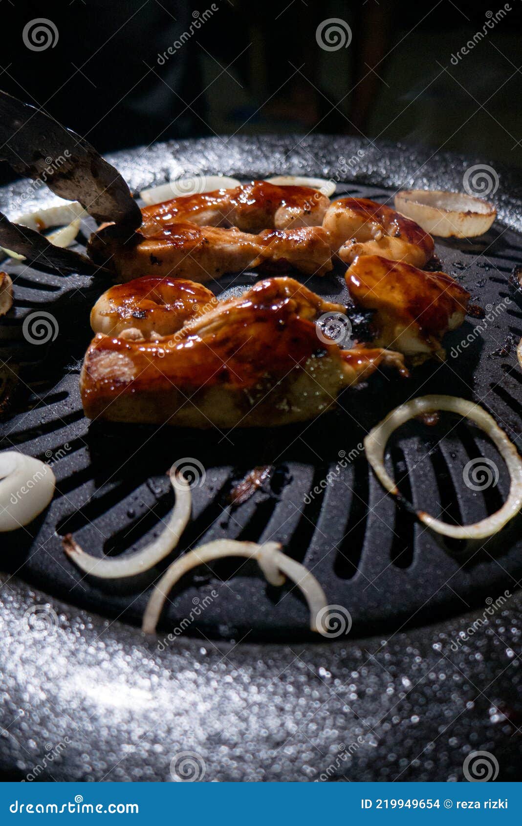 Grilled meat at night stock photo. Image of meat, seafood - 219949654