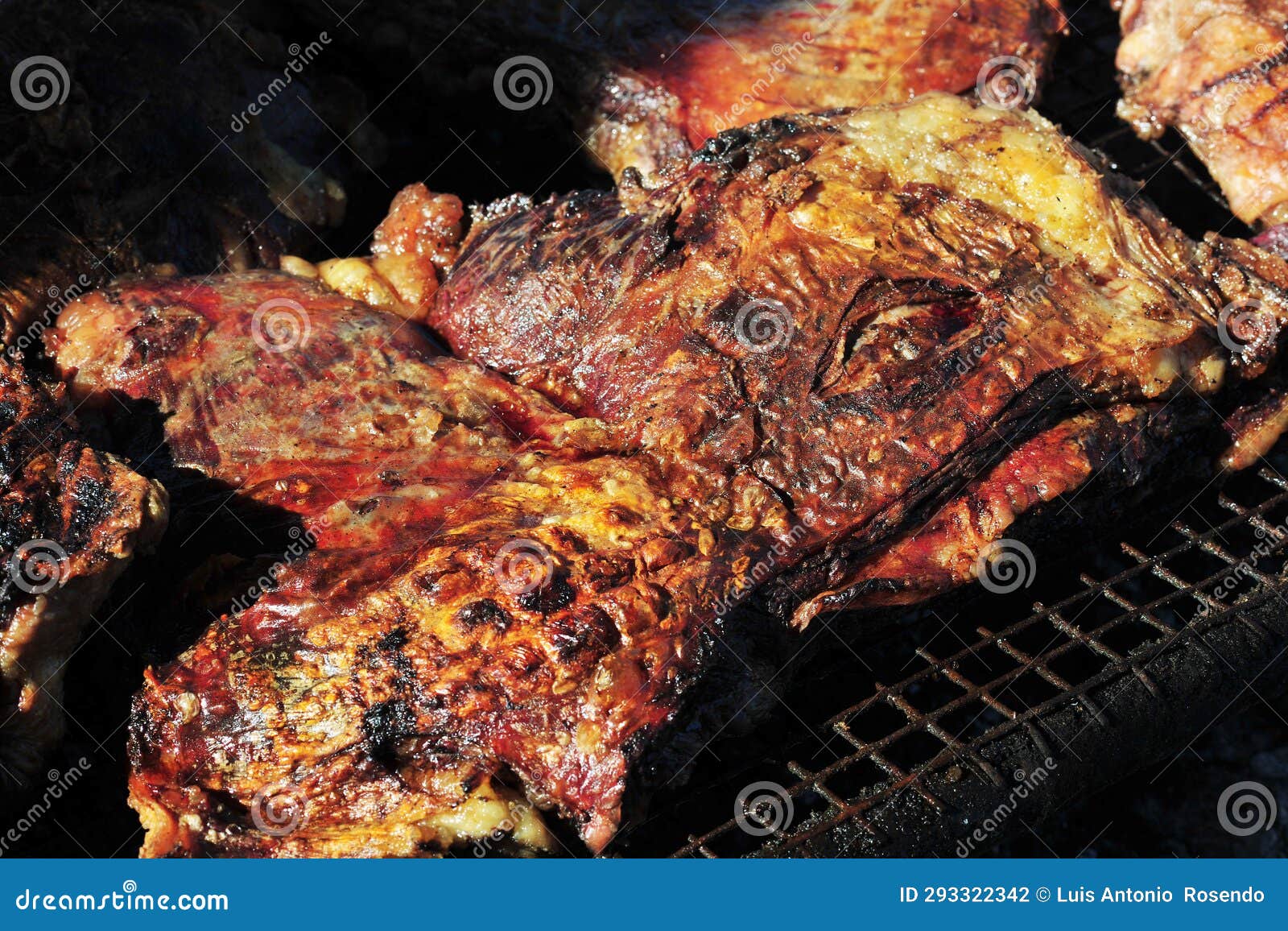Grilled Meat Meat on Spit with Fire. Argentinian Steak Beef Meat Stock ...
