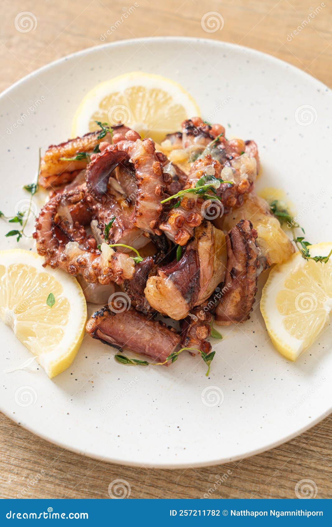 Grilled Octopus or Squid with Butter Lemon Sauce Stock Photo - Image of ...