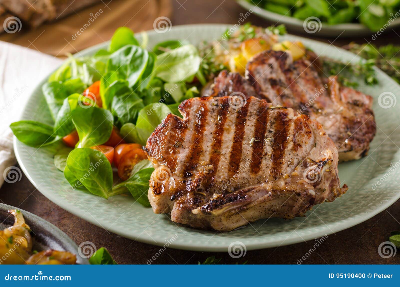 Grilled pork chops stock photo. Image of fillet, green - 95190400