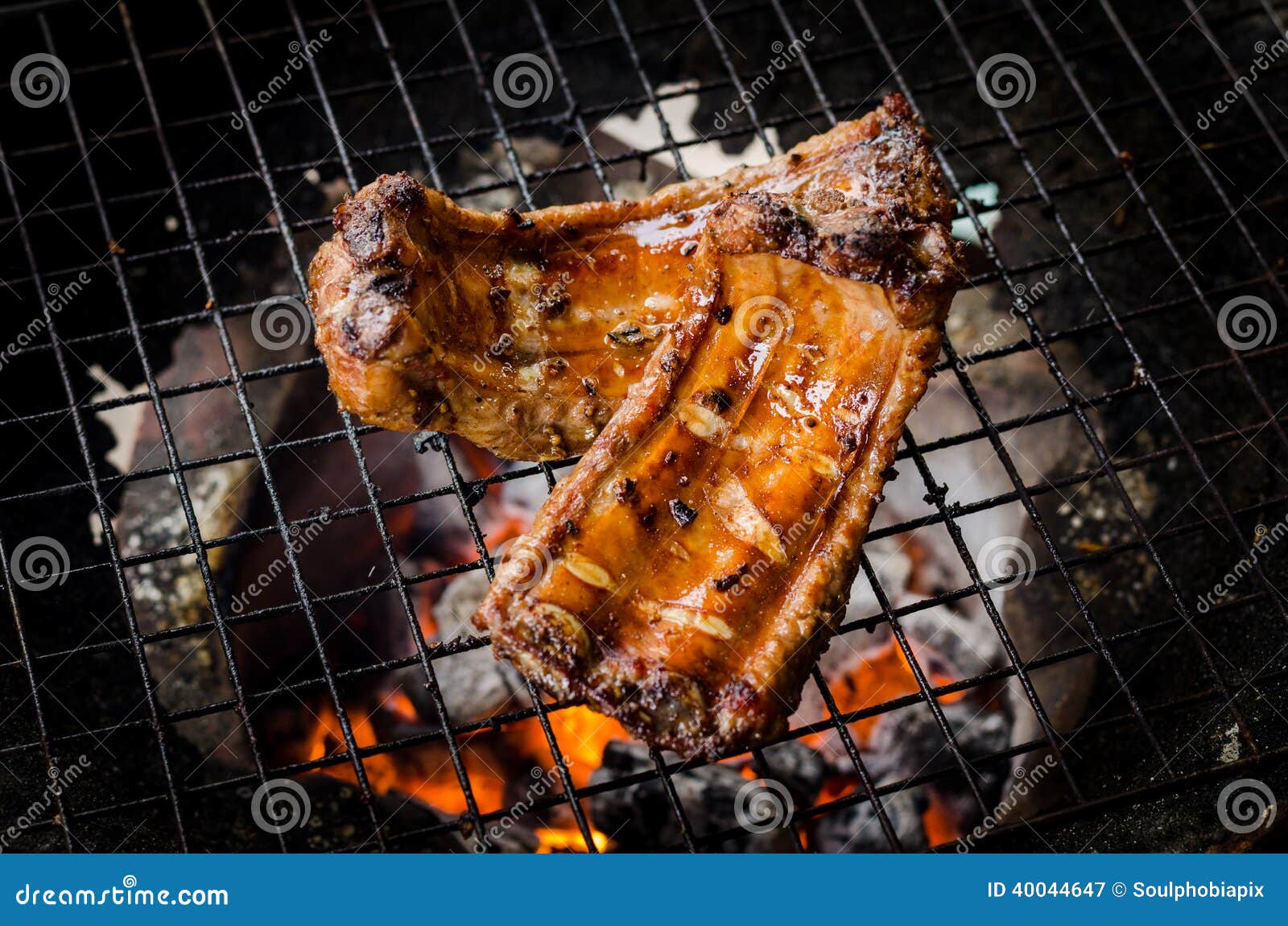 Grilled pork ribs stock image. Image of ribs, grill, grilling - 40044647