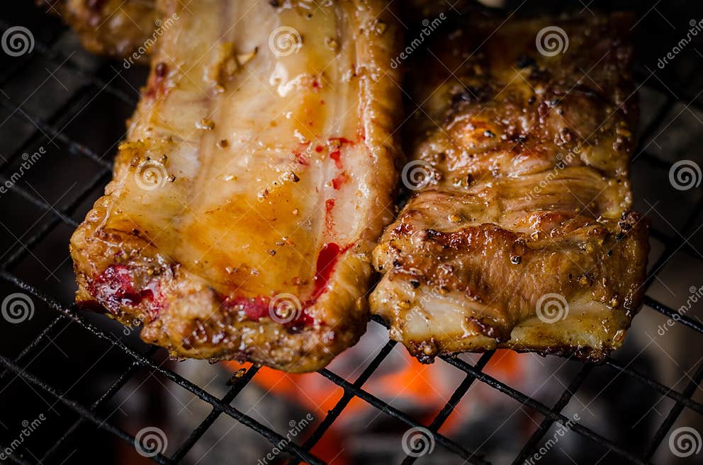 Grilled pork ribs stock image. Image of cooking, ribs - 40044703