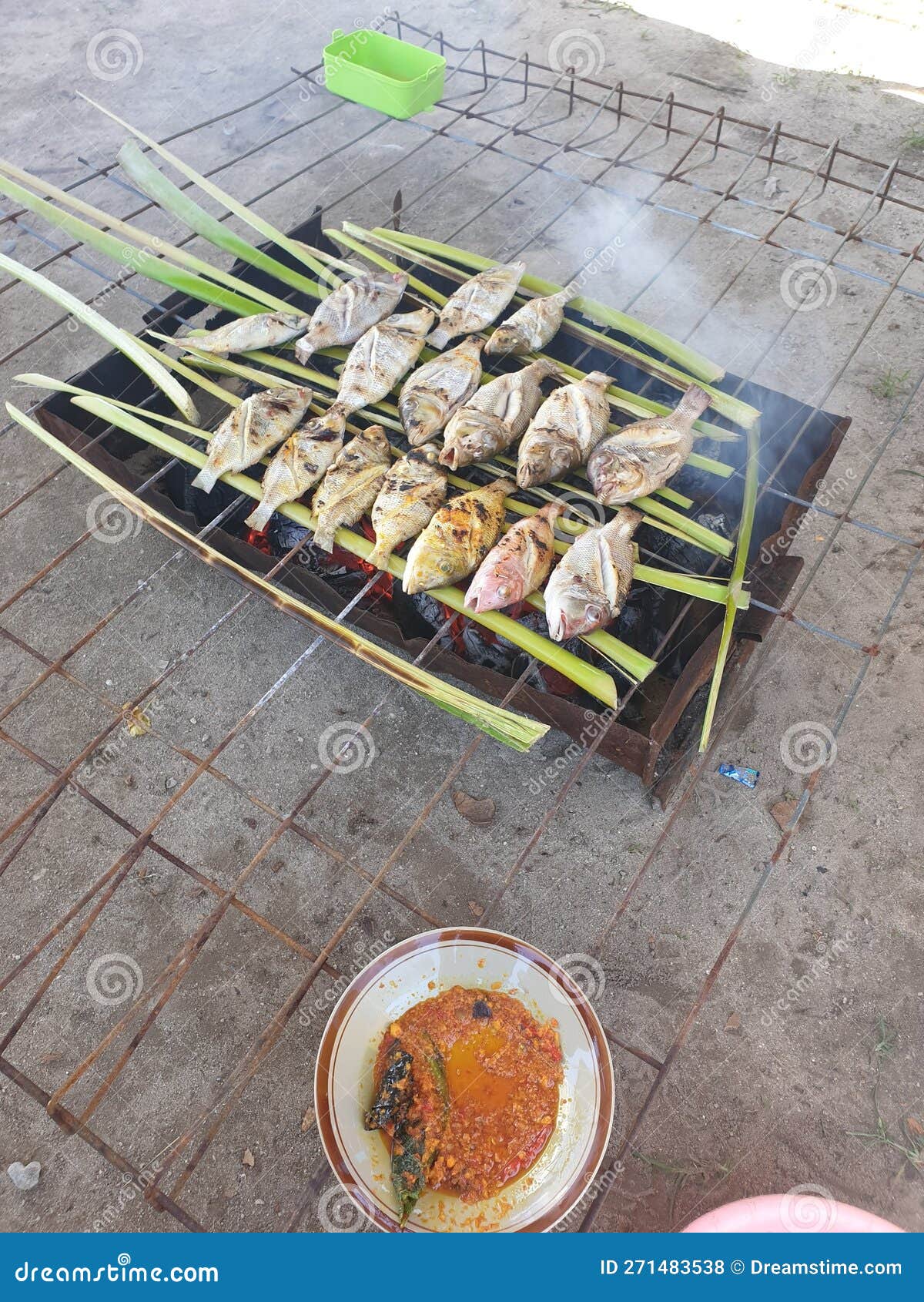 Grilled Reef Fish Using Coconut Shell in Maluku Stock Photo - Image of ...