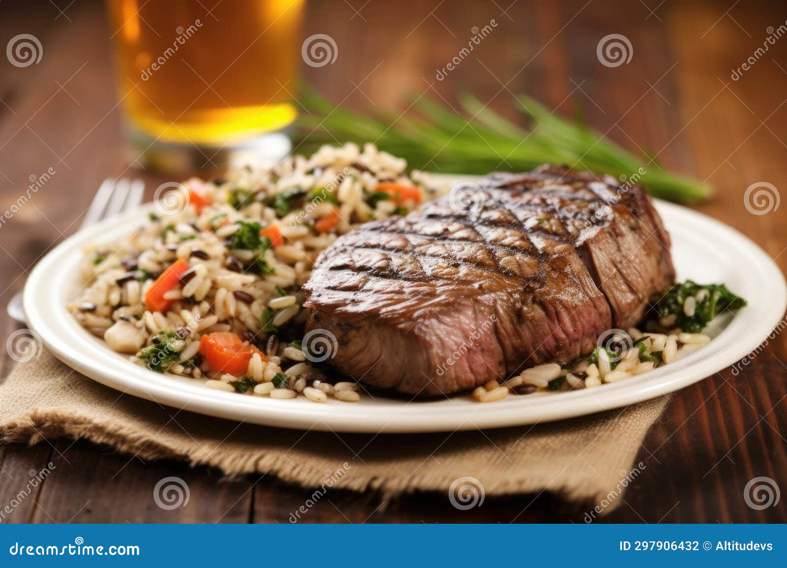 Grilled Ribeye Steak on a Bed of Wild Rice Stock Photo - Image of ...