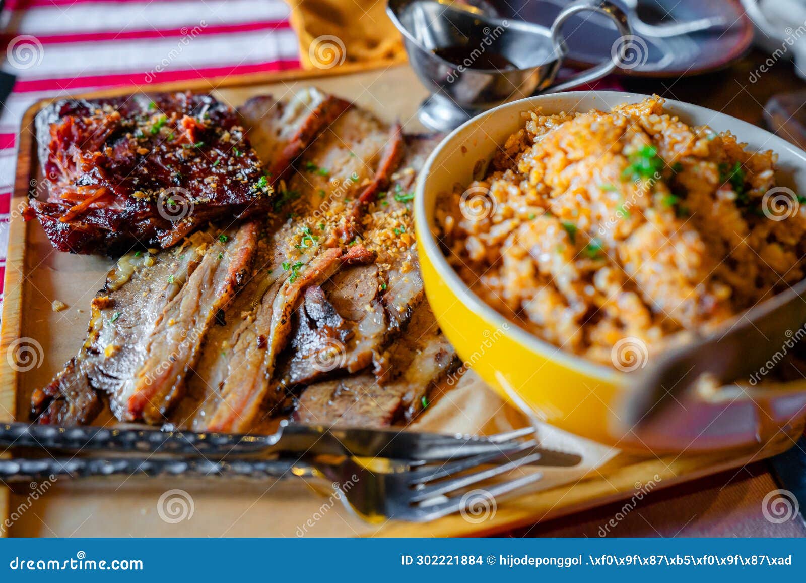 Grilled Ribs and Prok Belly Striped Served with Sauce and Java Rice ...