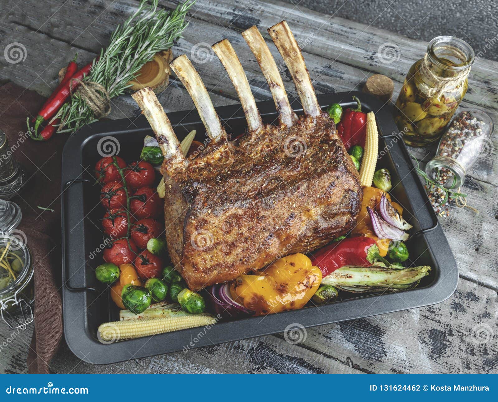 Grilled Roasted Rack of Lamb,mutton with Vegetables on the Baking Sheet ...