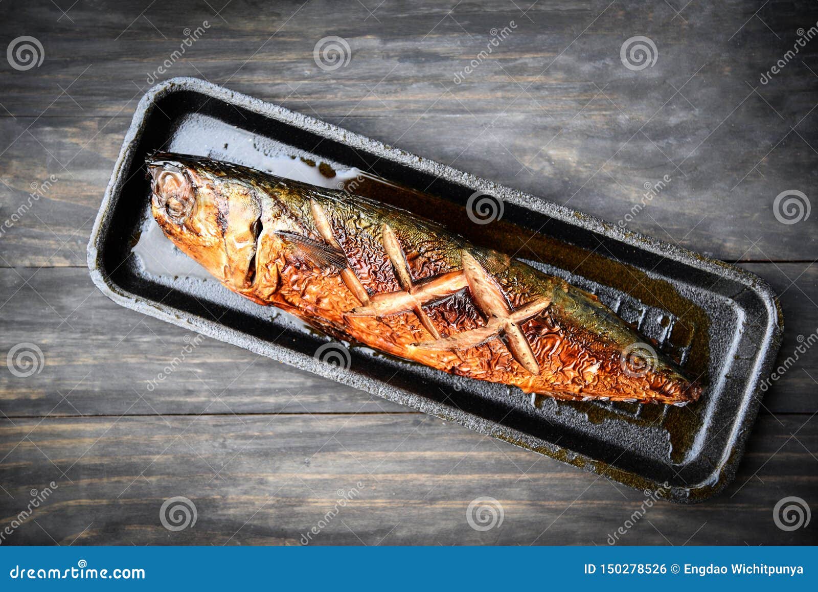 Grilled Saba Fish with Sweet Sauce on Tray with Dark Background Stock ...