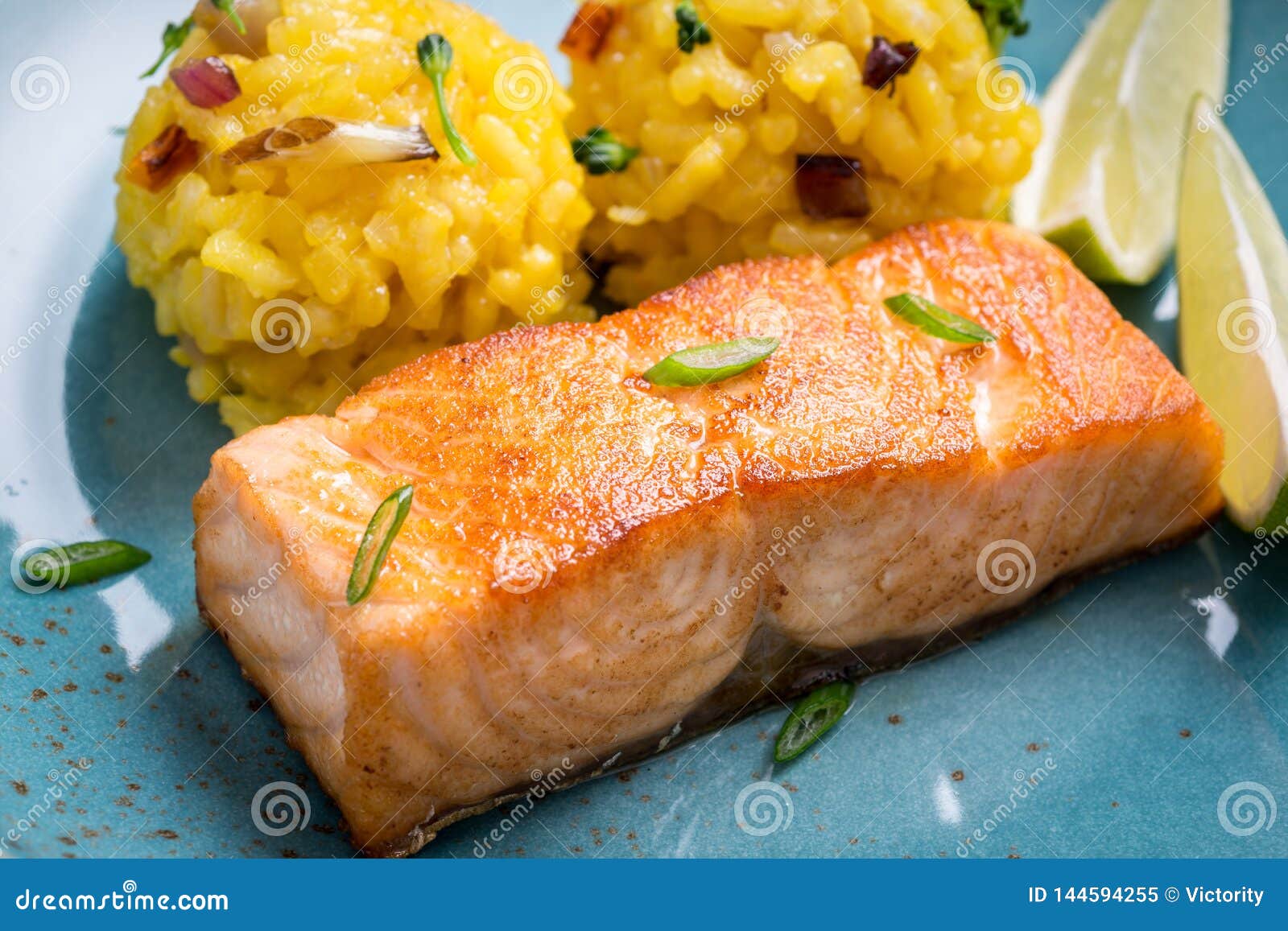 Grilled Salmon Fillet with Saffron Risotto Stock Image - Image of ...
