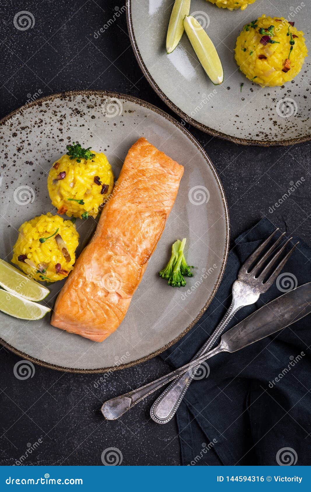 Grilled Salmon Fillet with Saffron Risotto Stock Photo - Image of plate ...