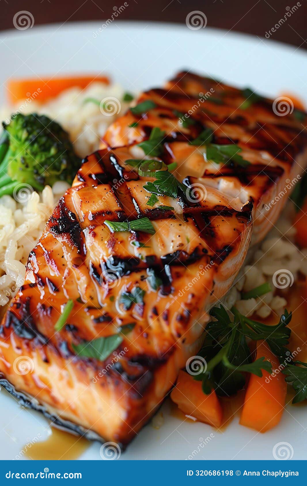 Grilled Salmon with Rice Pilaf and Steamed Vegetables Stock Photo ...
