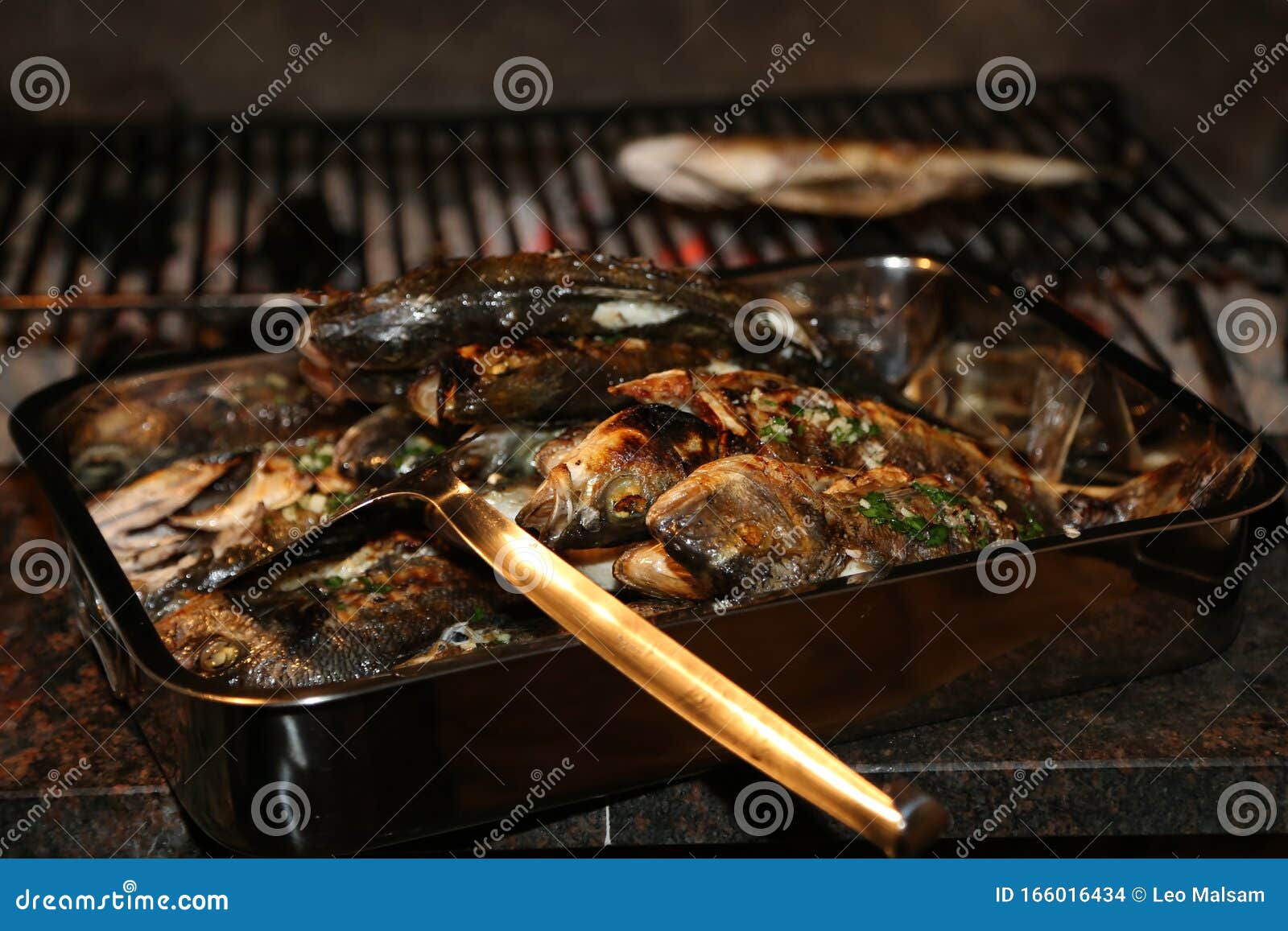 Grilled Sea Fish Stands on the Table Stock Photo - Image of plate, food ...