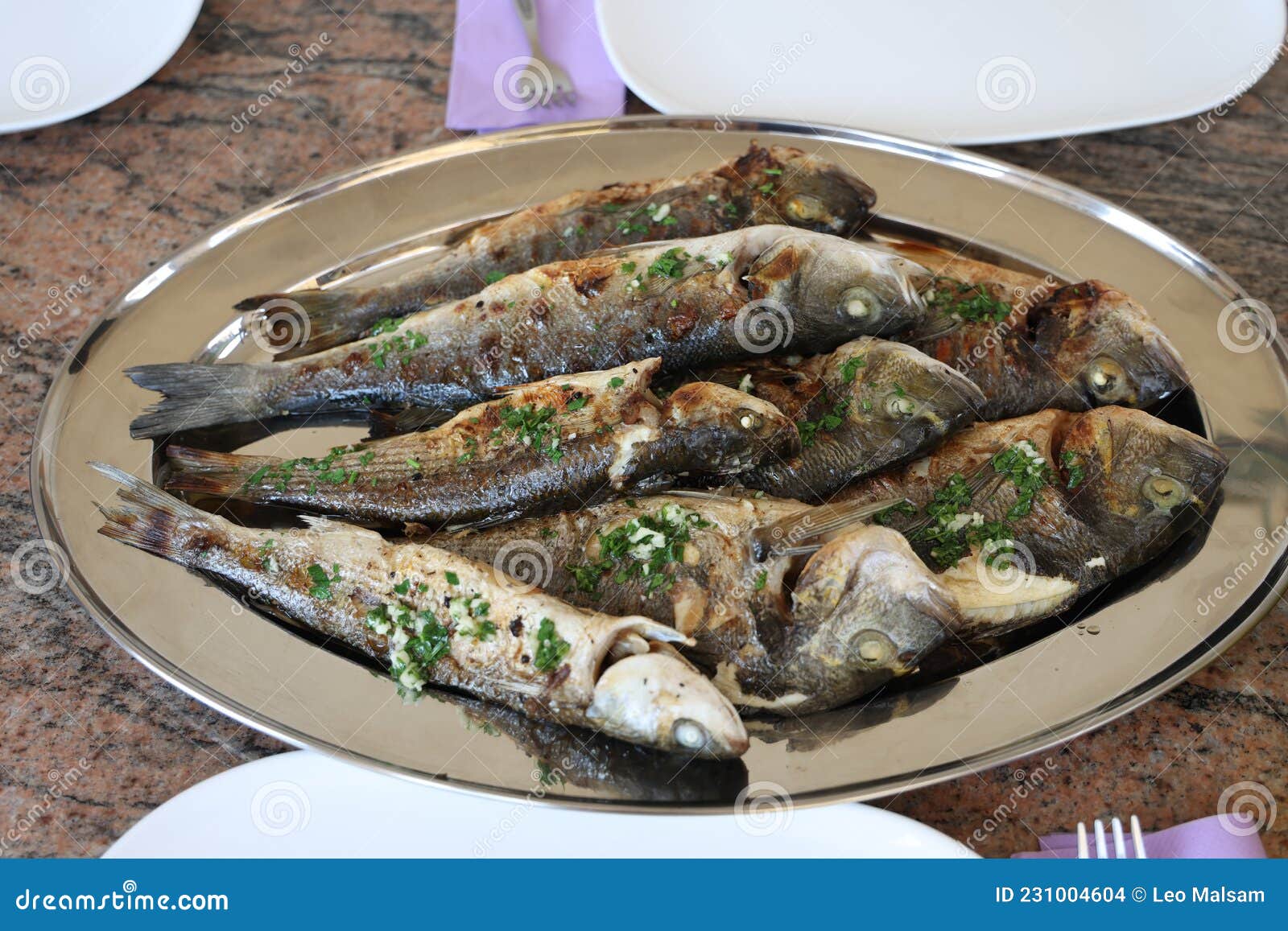Grilled Sea Fish Stands on the Table Stock Photo - Image of traditional ...