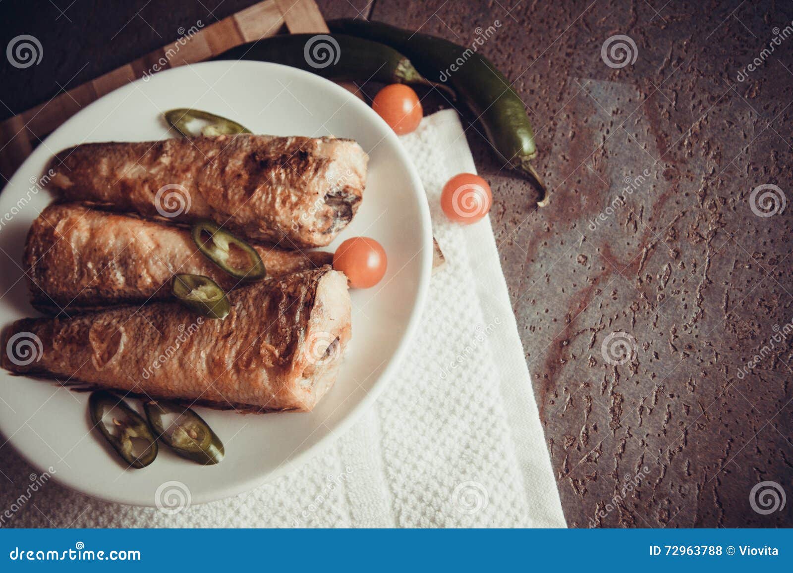 Grilled shad with tomato stock photo. Image of plate - 72963788