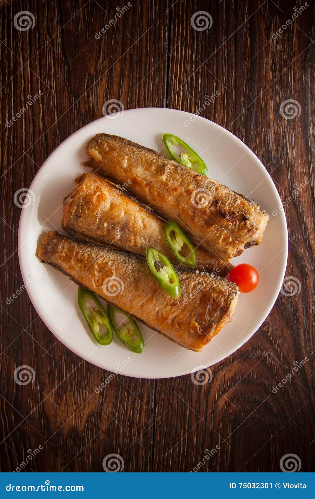 Grilled shad with tomato stock image. Image of plate - 75032301