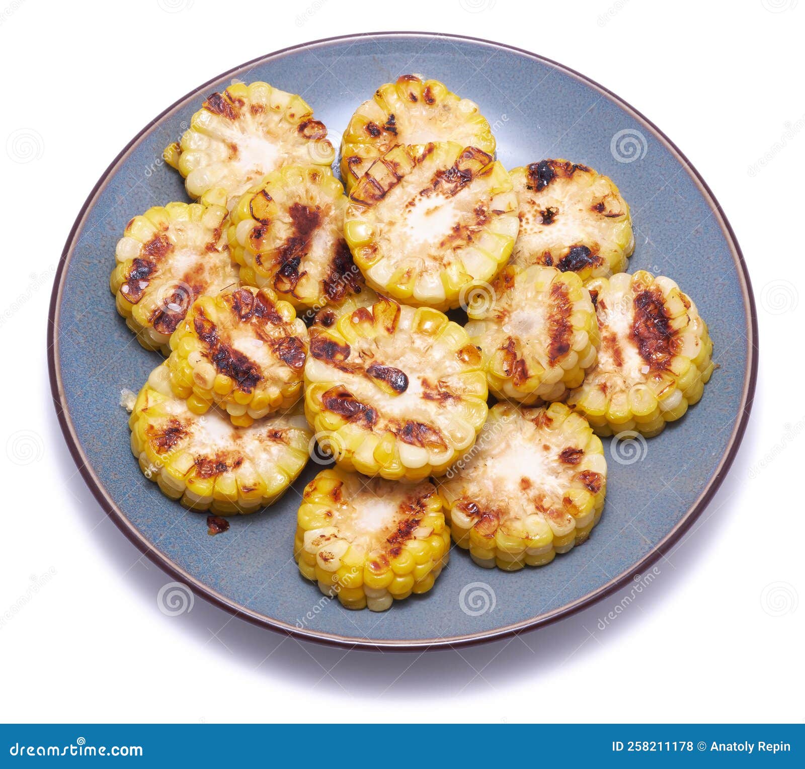 Grilled Slices of Corn Cobs with Stripes from a Grill in Ceramic Plate ...