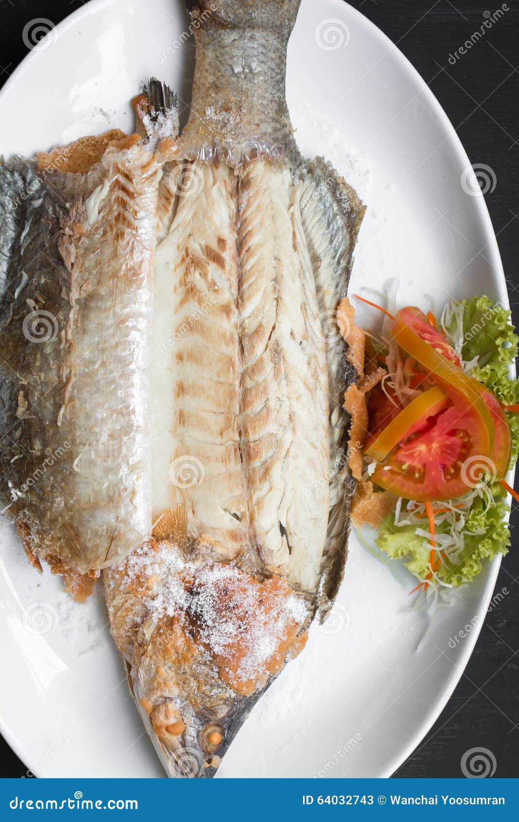 Grilled snapper with salt stock image. Image of gilt - 64032743