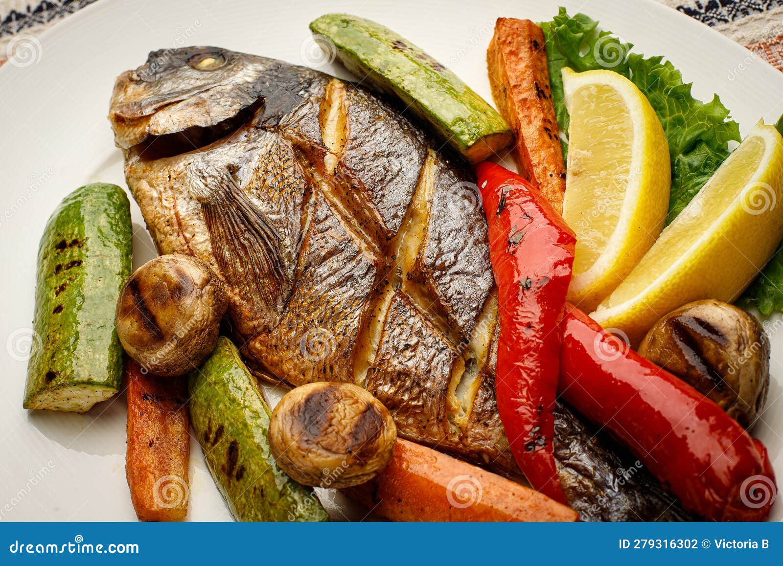 Grilled Spicy Fish Isolate on White Plate, Top View Stock Photo - Image ...