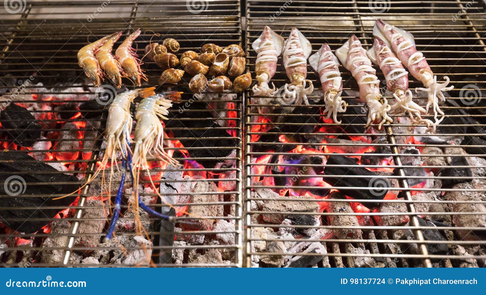 Grilled Squid, Shrimp, Shell Seafood on the Grill Background. Stock ...