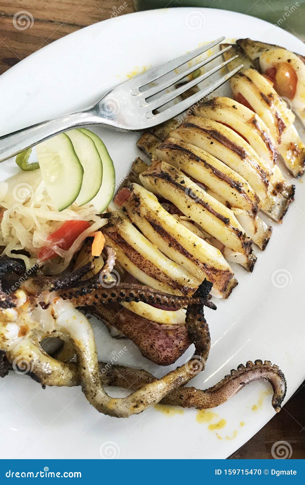 Grilled Squid, Sliced on a Plate Stock Photo - Image of grilled ...