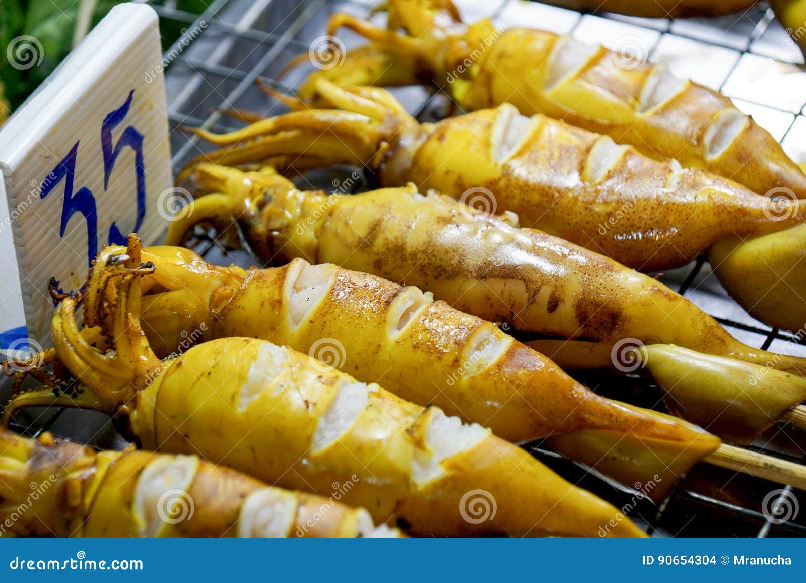 Grilled squid with stick stock photo. Image of cooking - 90654304