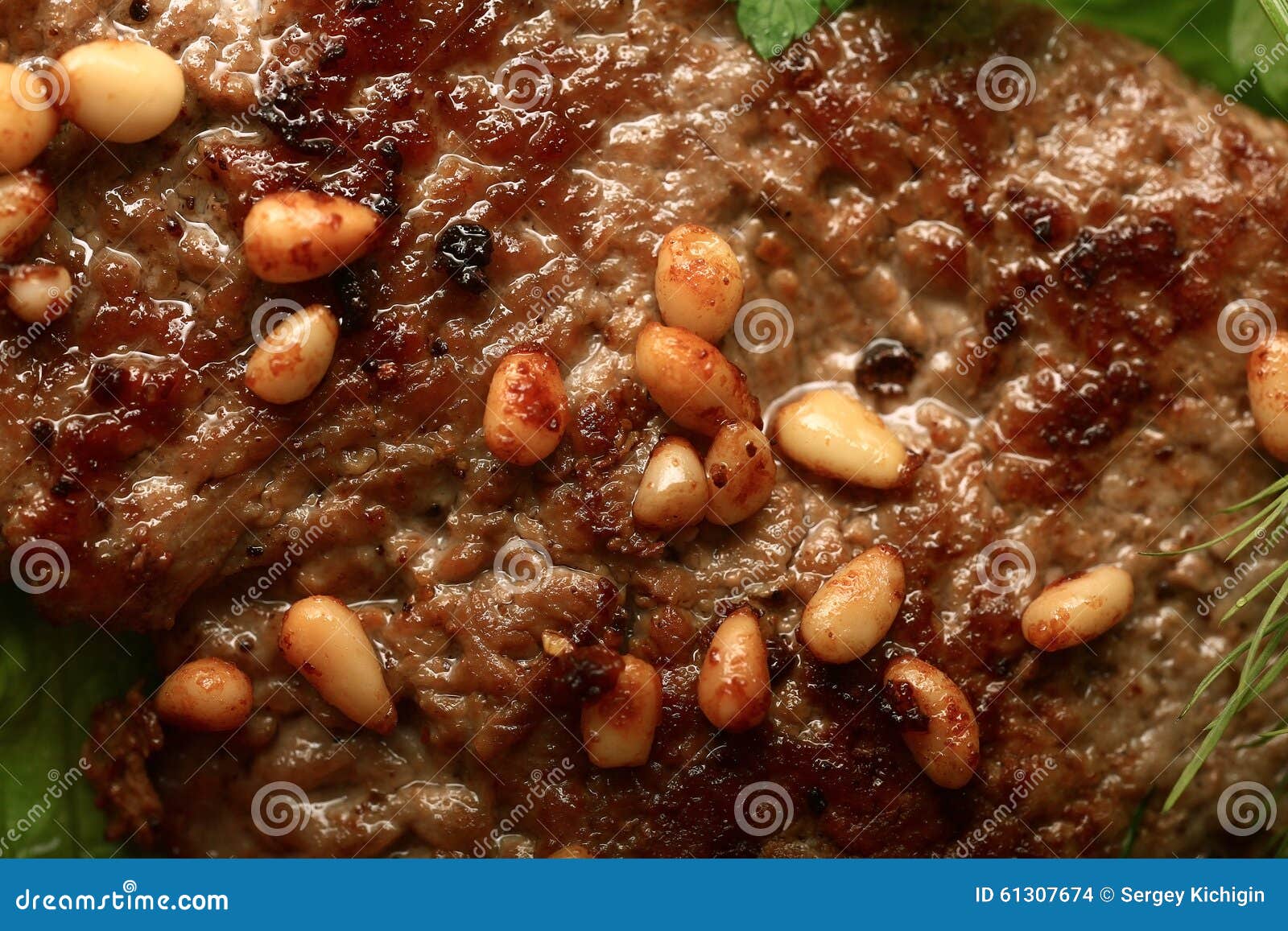 Grilled steak with nuts stock photo. Image of beefsteak - 61307674