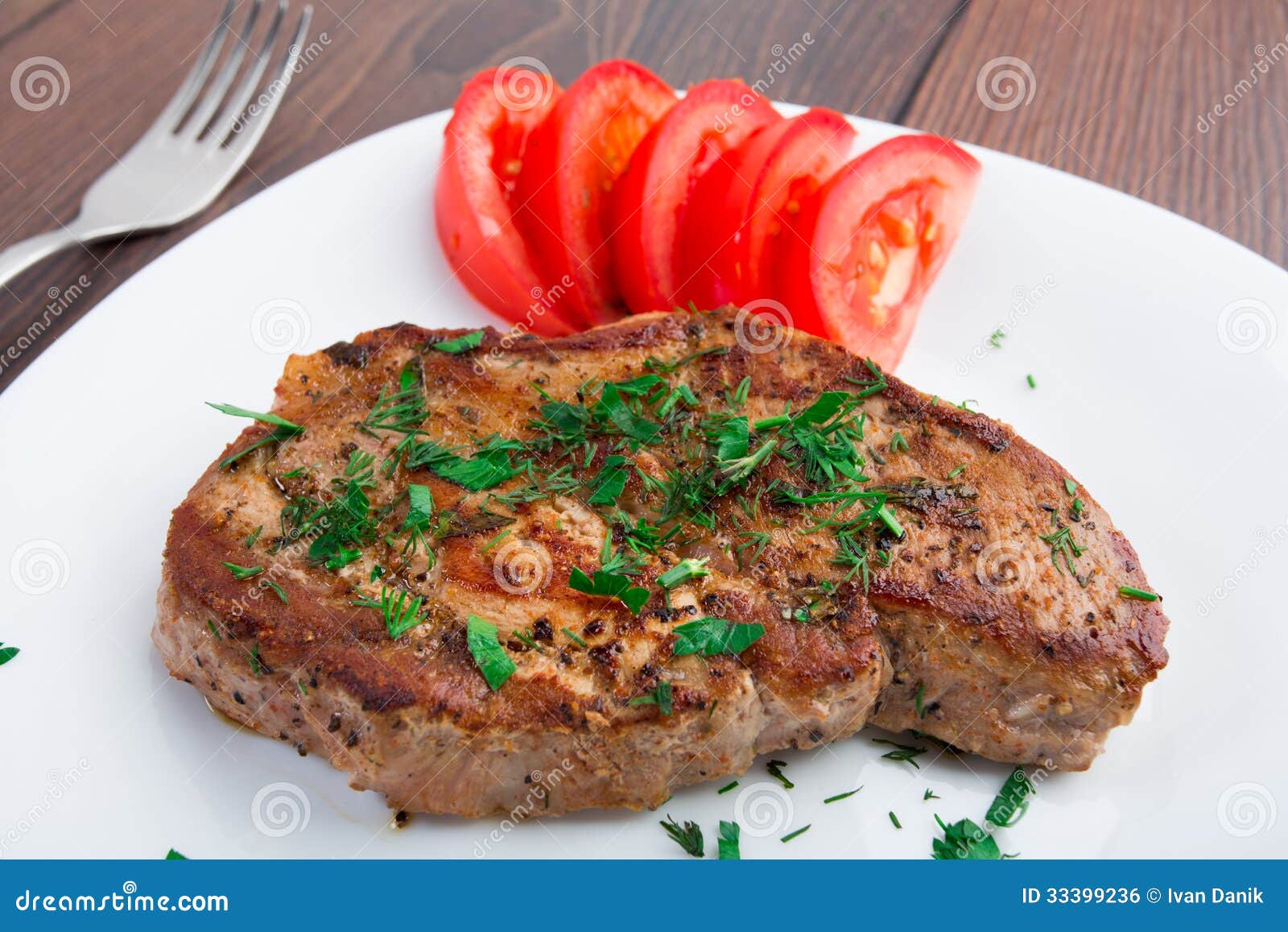 Grilled Steak on White Plate Stock Photo - Image of veal, fork: 33399236