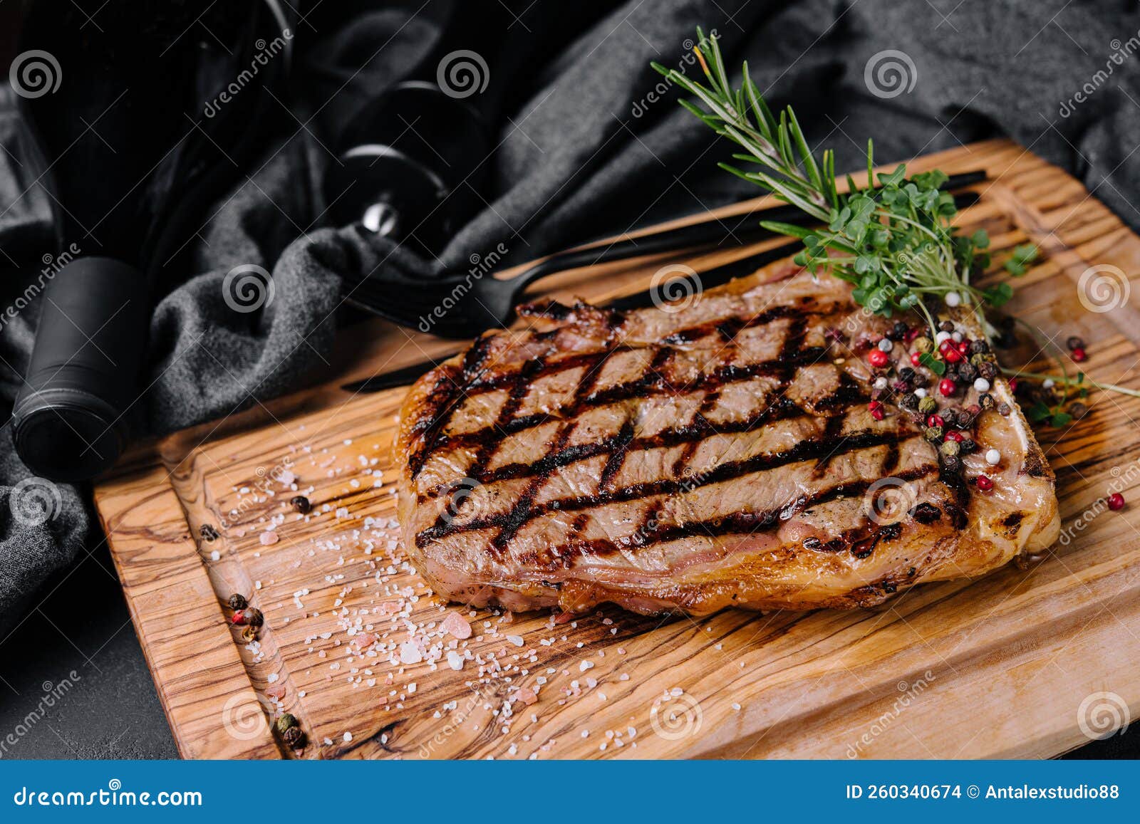 Grilled Striploin Sliced Steak on Cutting Board Over Stone Table Stock ...
