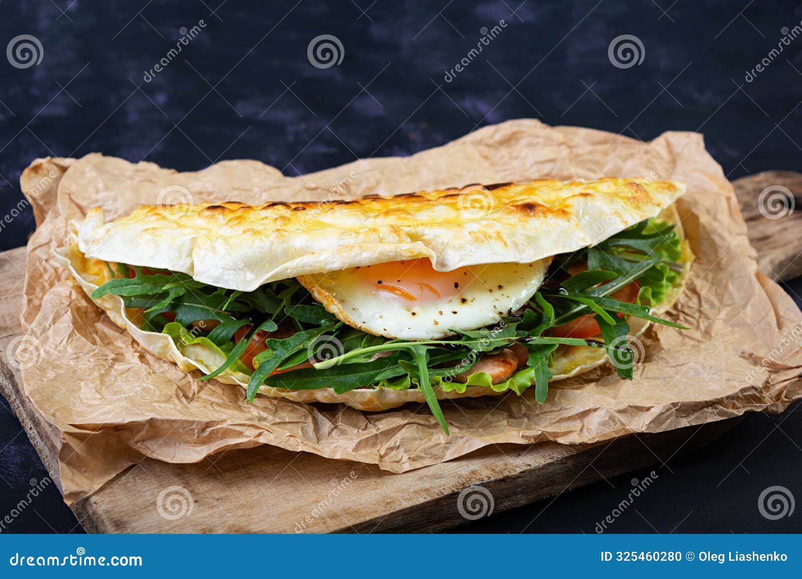 Grilled Stuffed Lavash with Herbs, Tomato and Egg. Lavash Sandwich ...