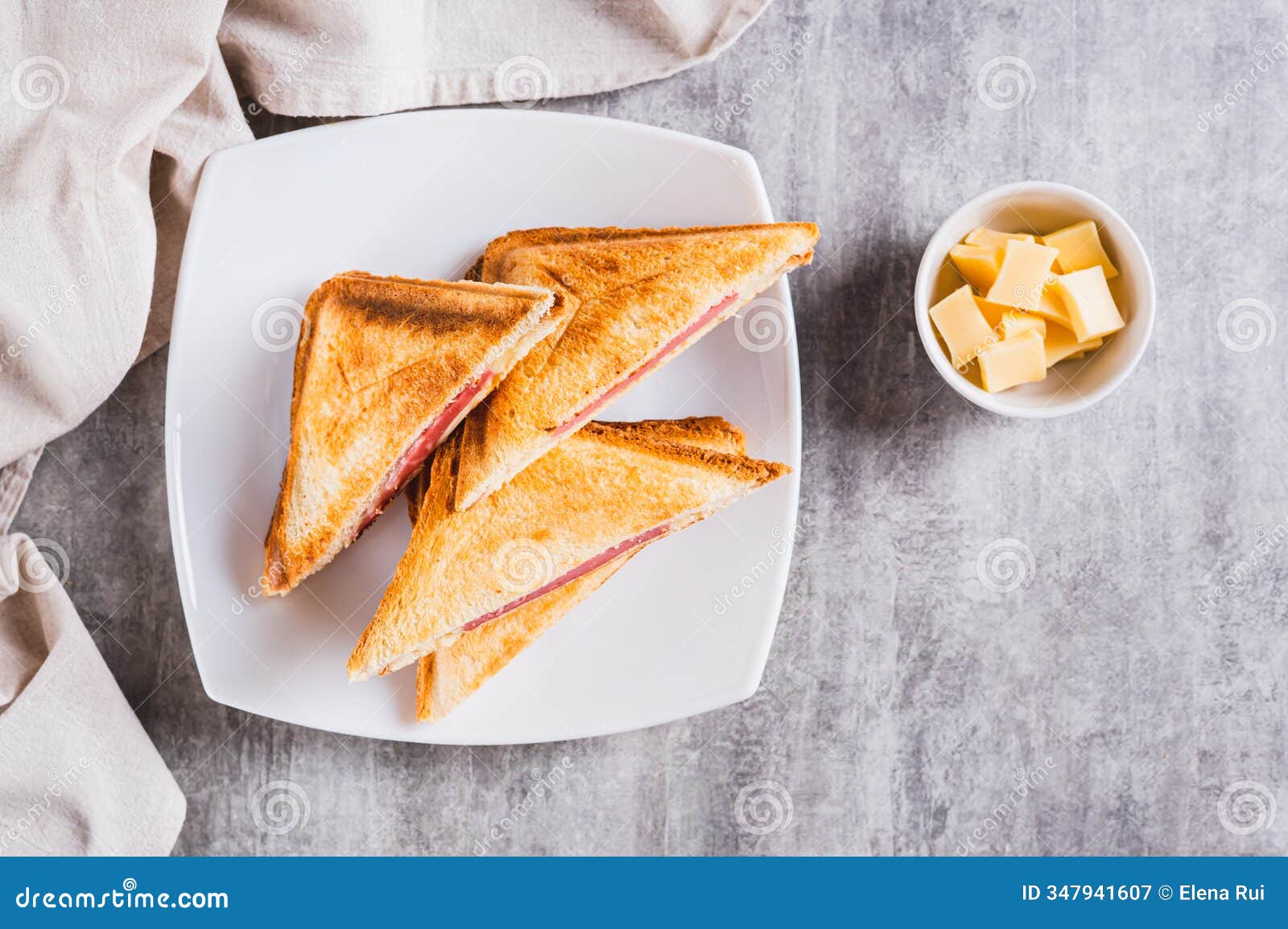 Grilled Triangle Sandwiches with Cheese and Sausage on a Plate on a ...