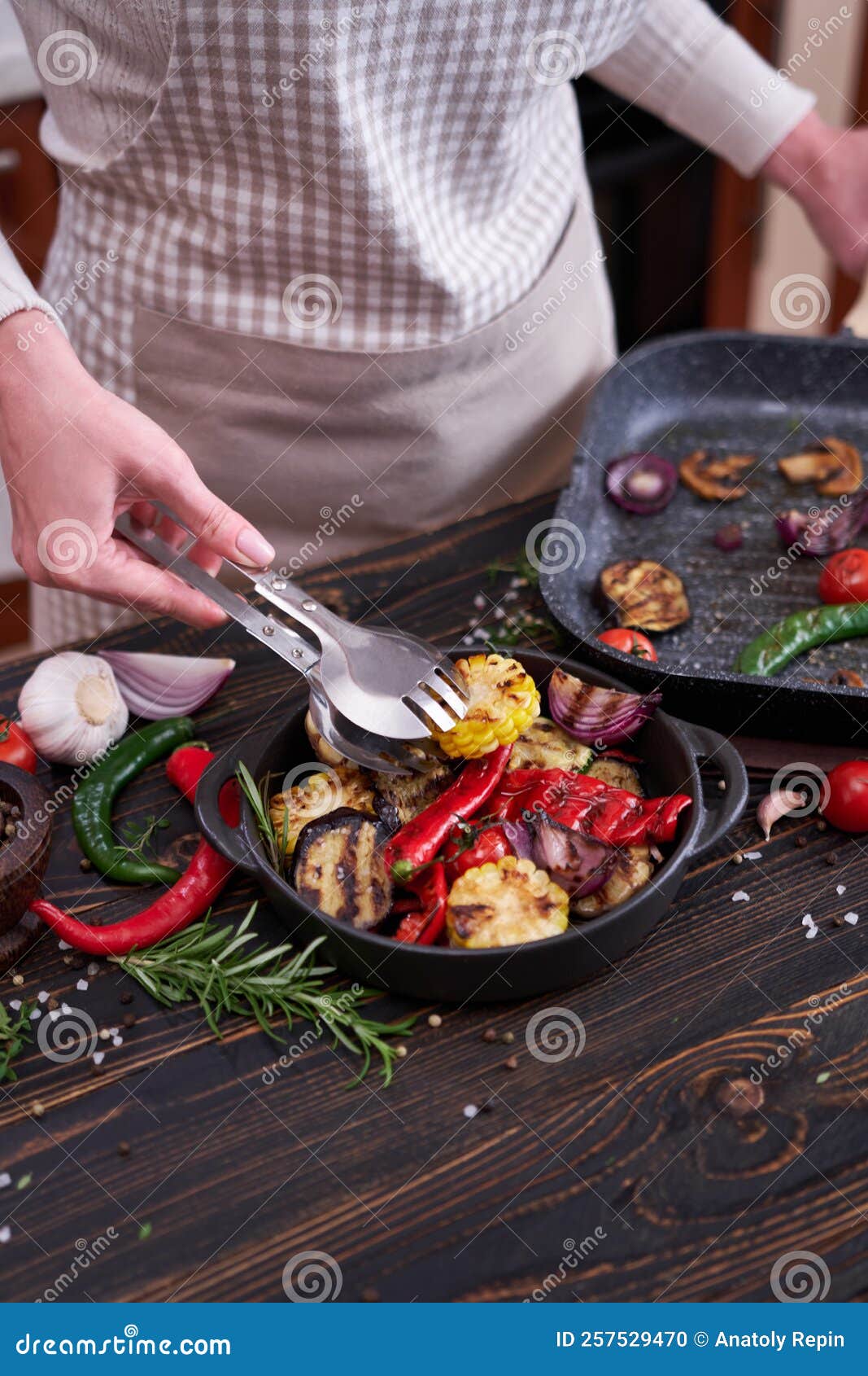 Grilled Vegetables in Black Ceramic Plate on Table at Domestic Kitchen ...